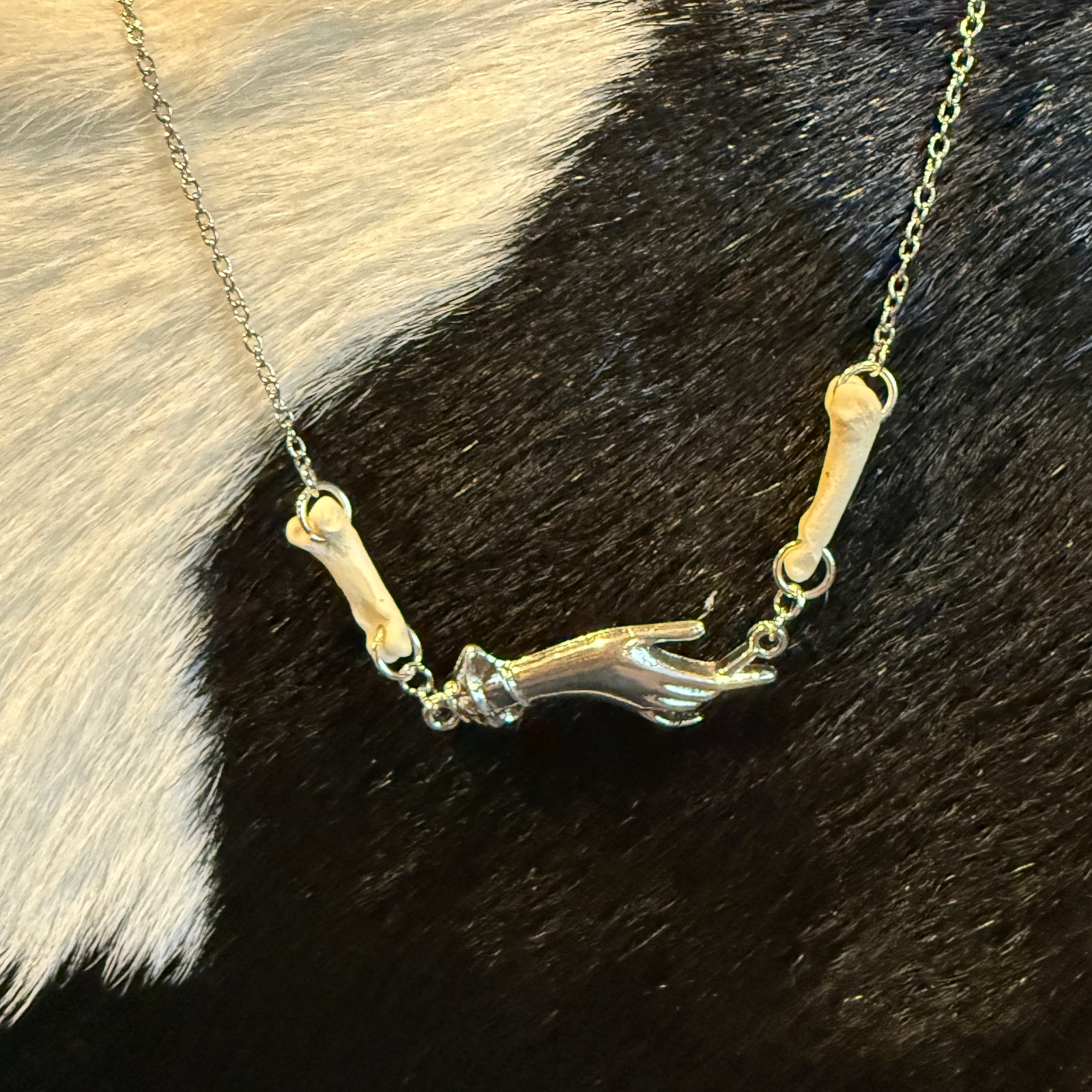 Silver Hand Otter Toe Bone Necklace